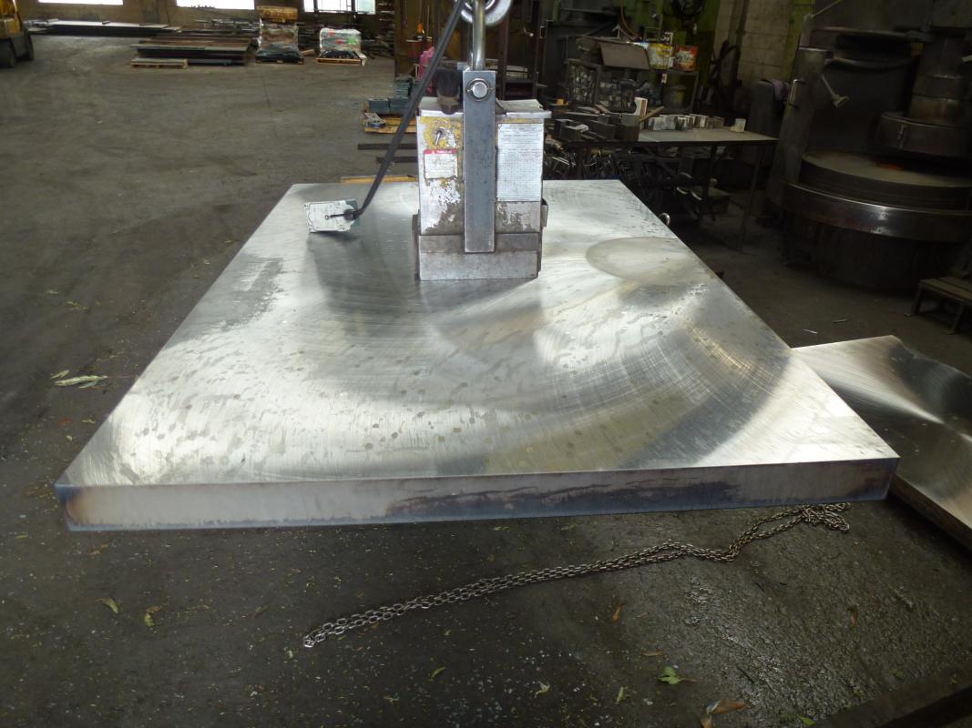Cut and grind large tooling plates